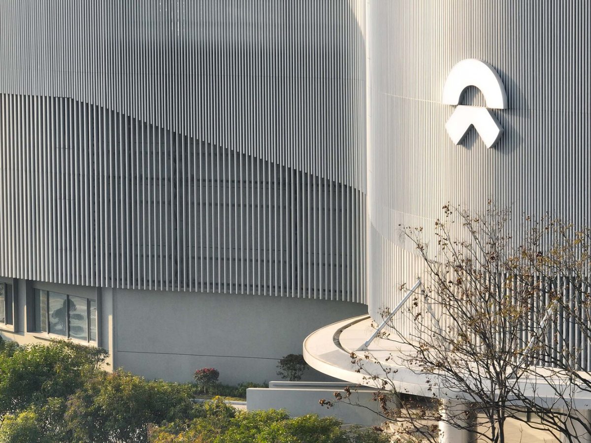 Reviving industrial factory into a flamboyant store - NIO Delivery ...