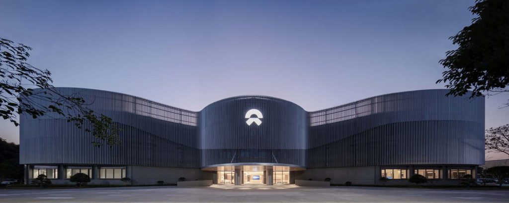 Reviving industrial factory into a flamboyant store - NIO Delivery ...