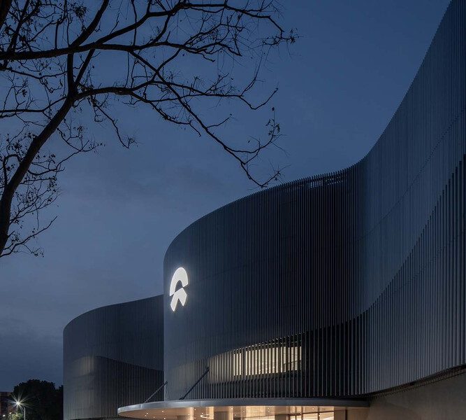 Reviving industrial factory into a flamboyant store - NIO Delivery ...