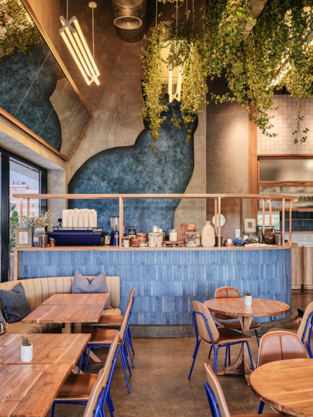 Discover the backyard-inspired Lazy Cat Café by H2R Design: A Brunch ...