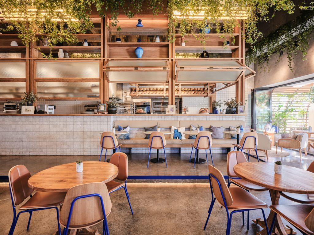 Discover the backyard-inspired Lazy Cat Café by H2R Design: A Brunch ...