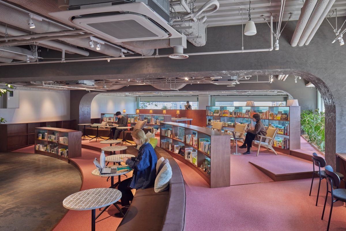 Tuck inside a cosy corner of this communal library inside Nippan Group's Tokyo Headquarters by ...