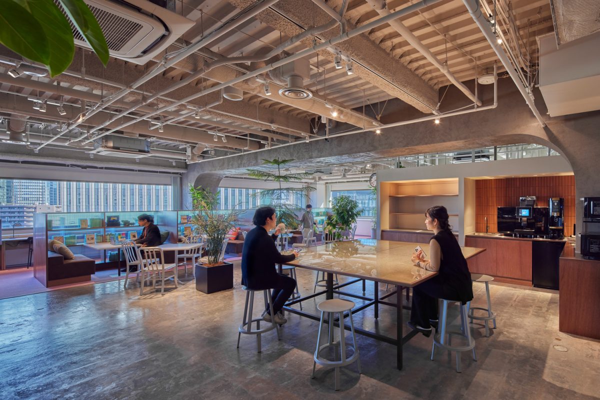 Tuck inside a cosy corner of this communal library inside Nippan Group ...