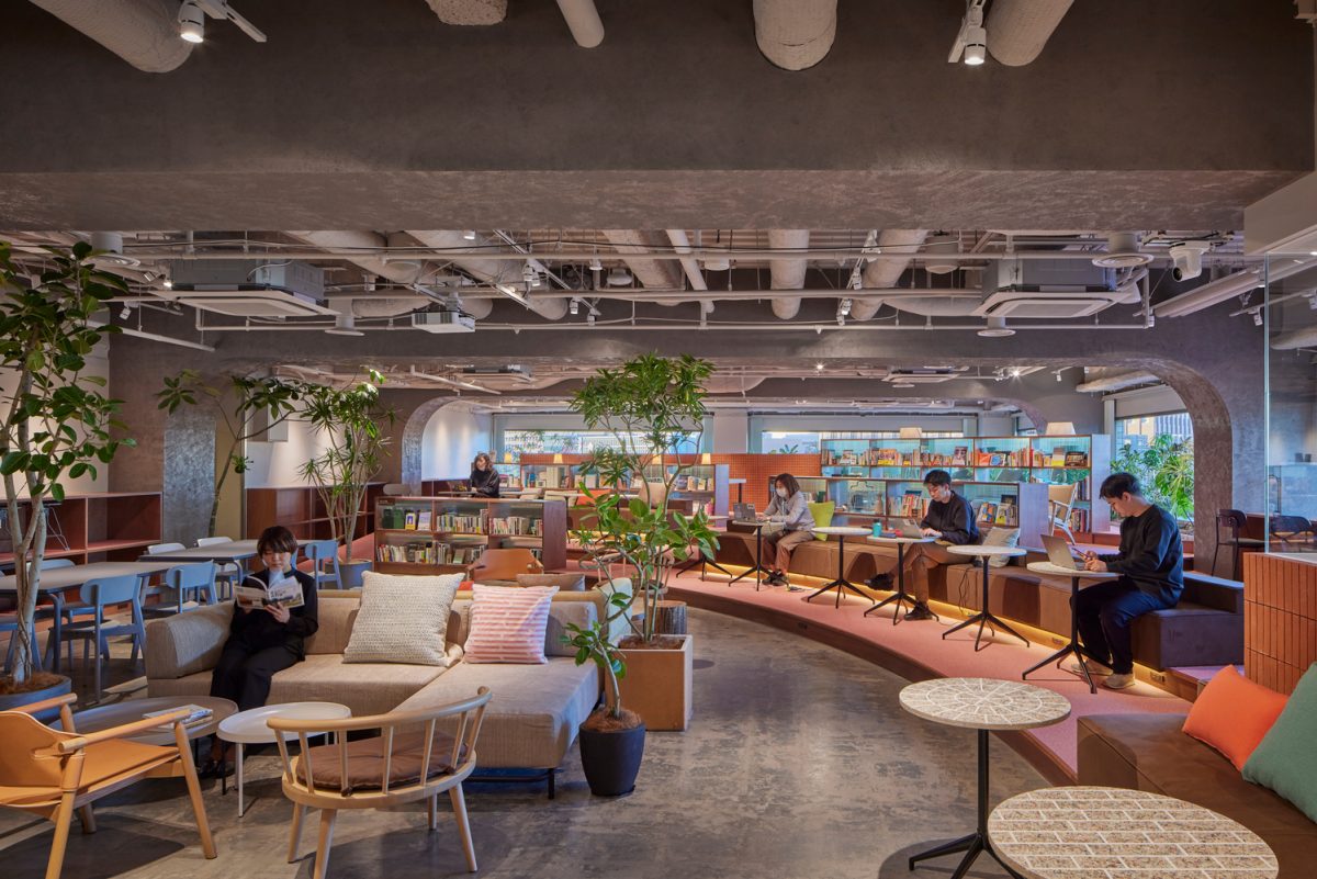 Tuck inside a cosy corner of this communal library inside Nippan Group ...