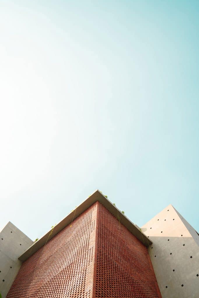 The Red Story: Façade redesign & redevelopment at IMT Manesar by Logic ...