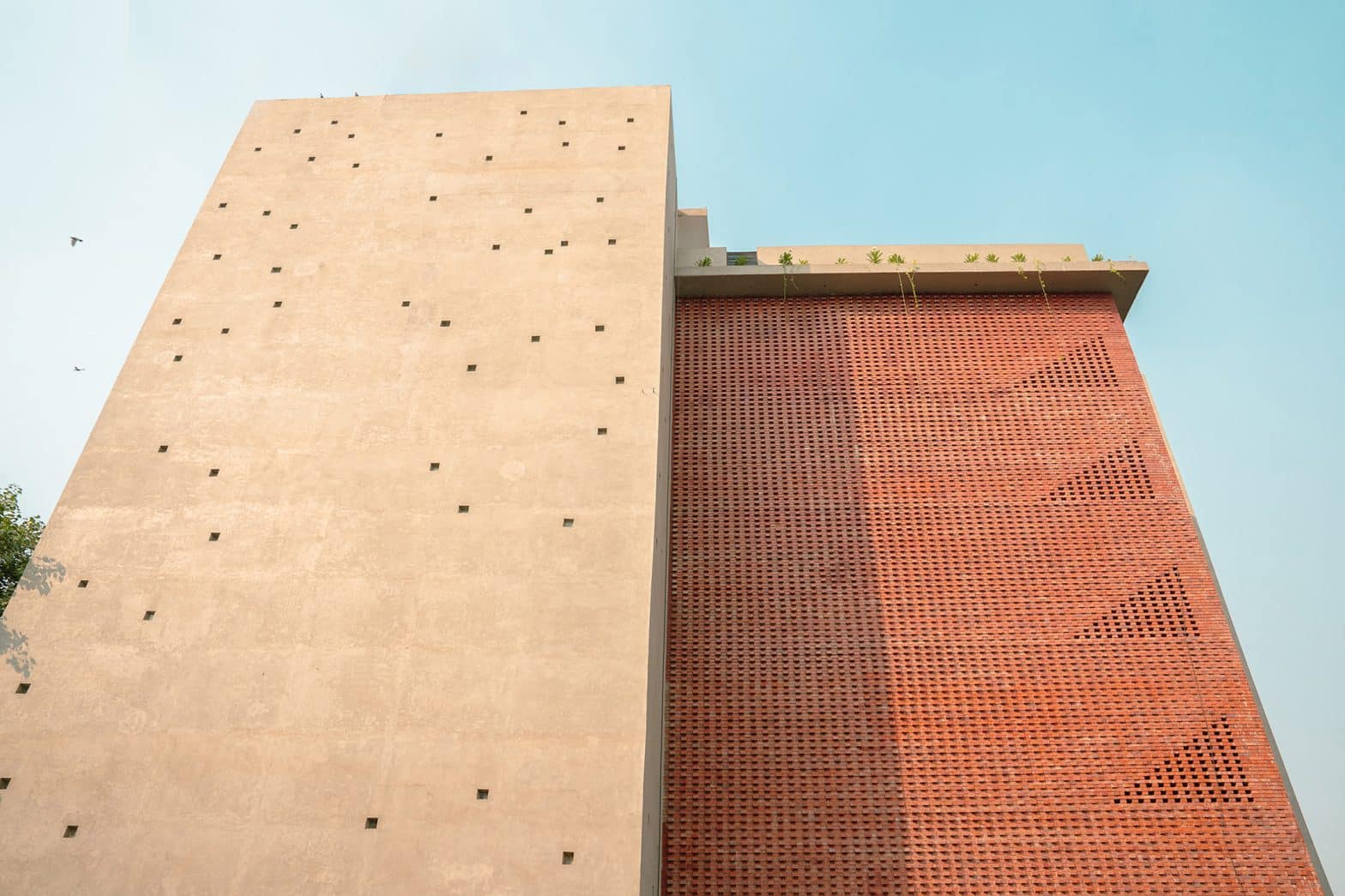 The Red Story: Façade redesign & redevelopment at IMT Manesar by Logic ...