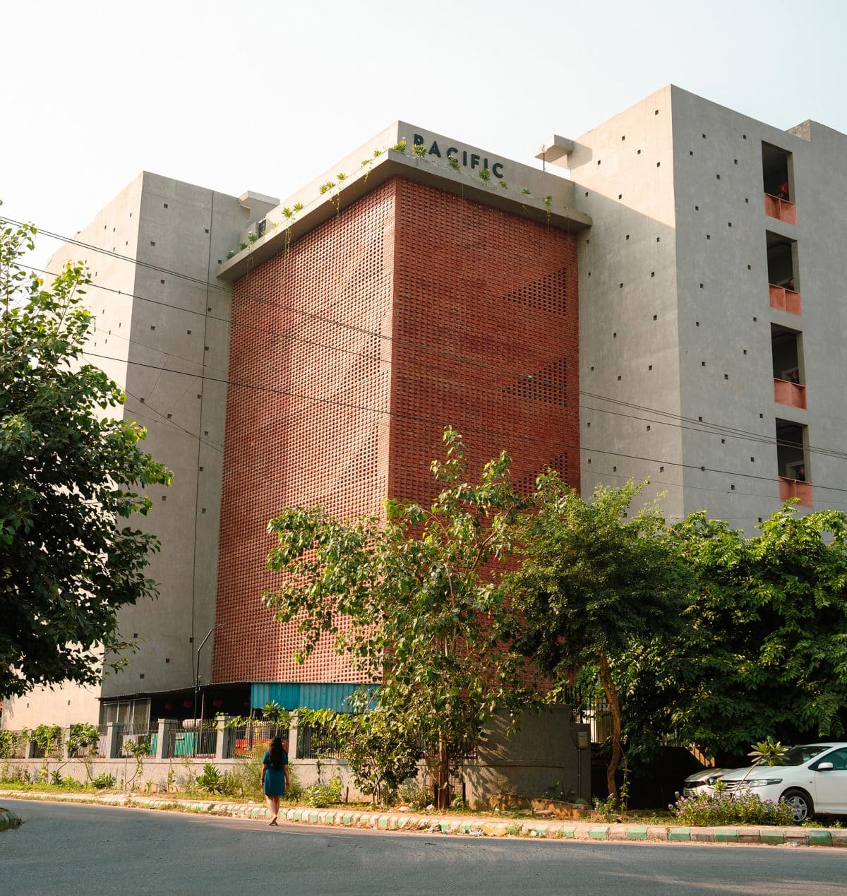 The Red Story: Façade redesign & redevelopment at IMT Manesar by Logic ...