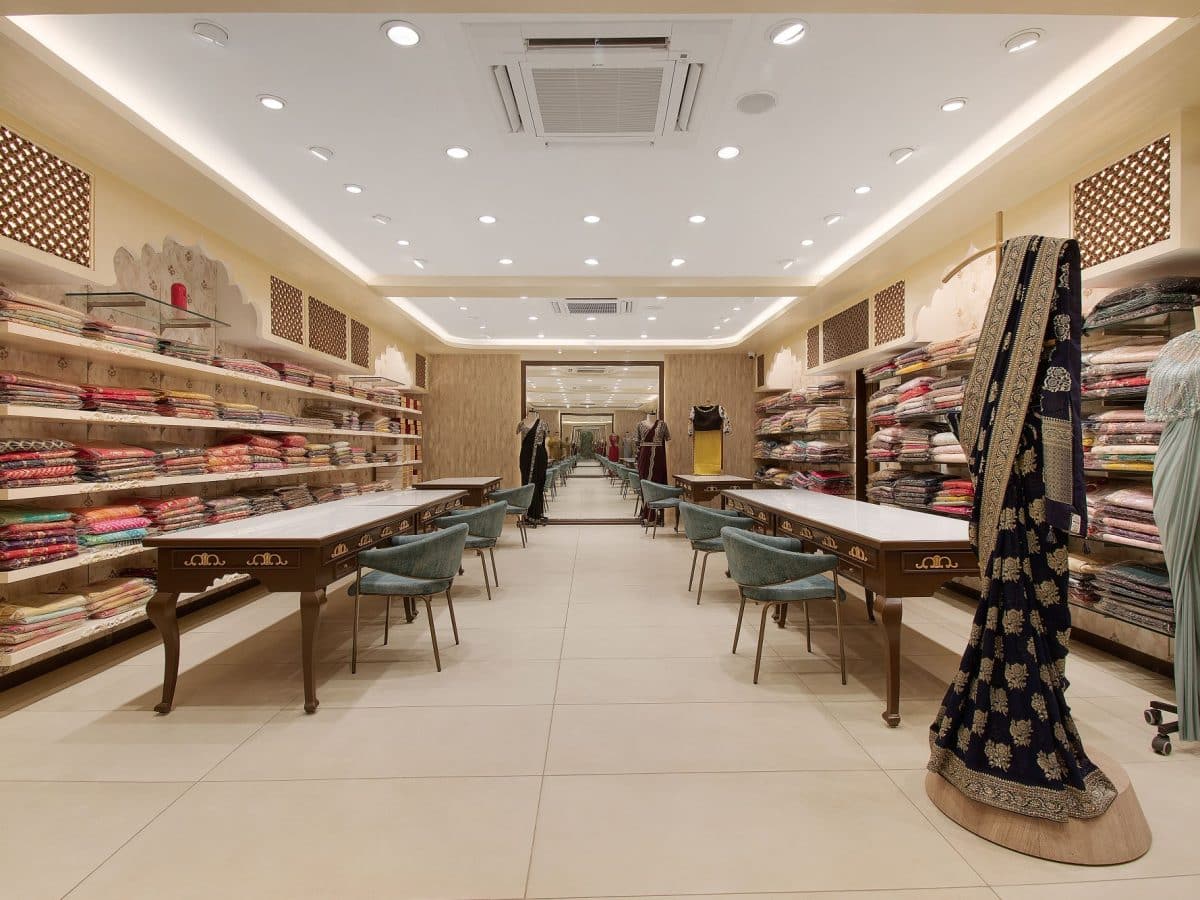 Timeless elegance of White Hanger - Designed by Mukesh Bhatia, founder ...