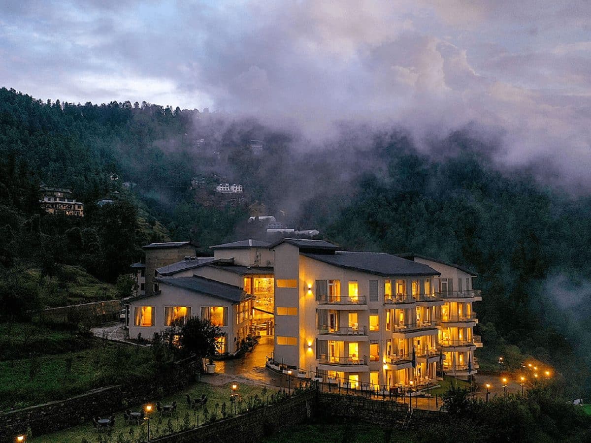 ITC Welcome Hotel by Ana Design Studio - Hotel embraces hill contours ...